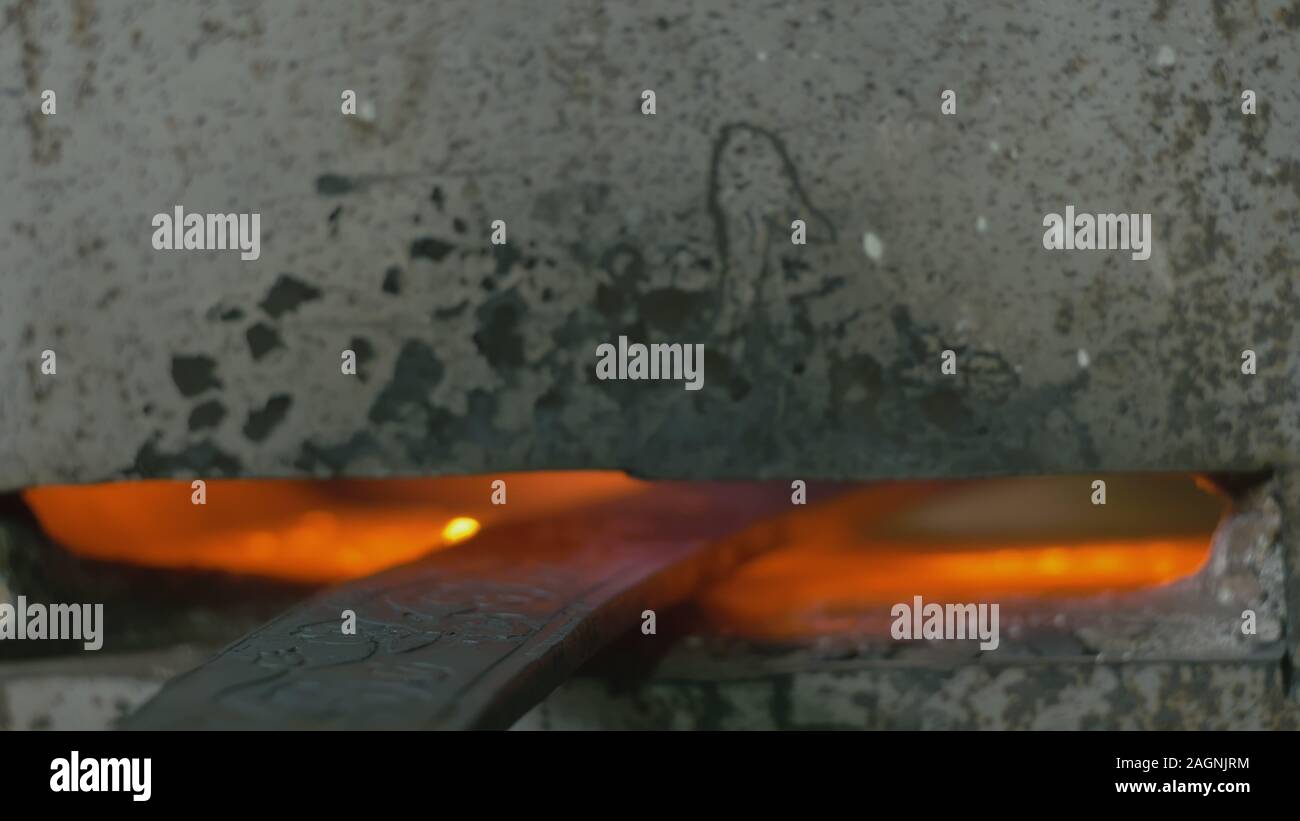 Forge workshop. Smithy manual production. Gas furnace for heating metal ...