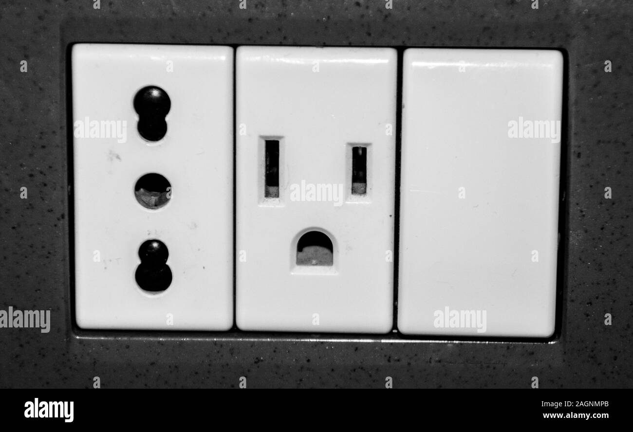 A typical American plug socket which looks like a frightened face Stock ...
