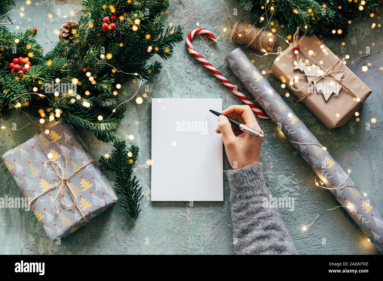 hand writes plans for the year Stock Photo - Alamy