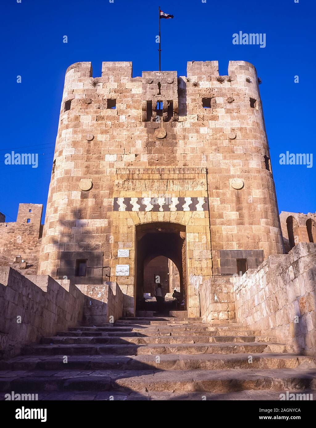 Syria. The main entrance to the formidable Citadel Fortress that ...