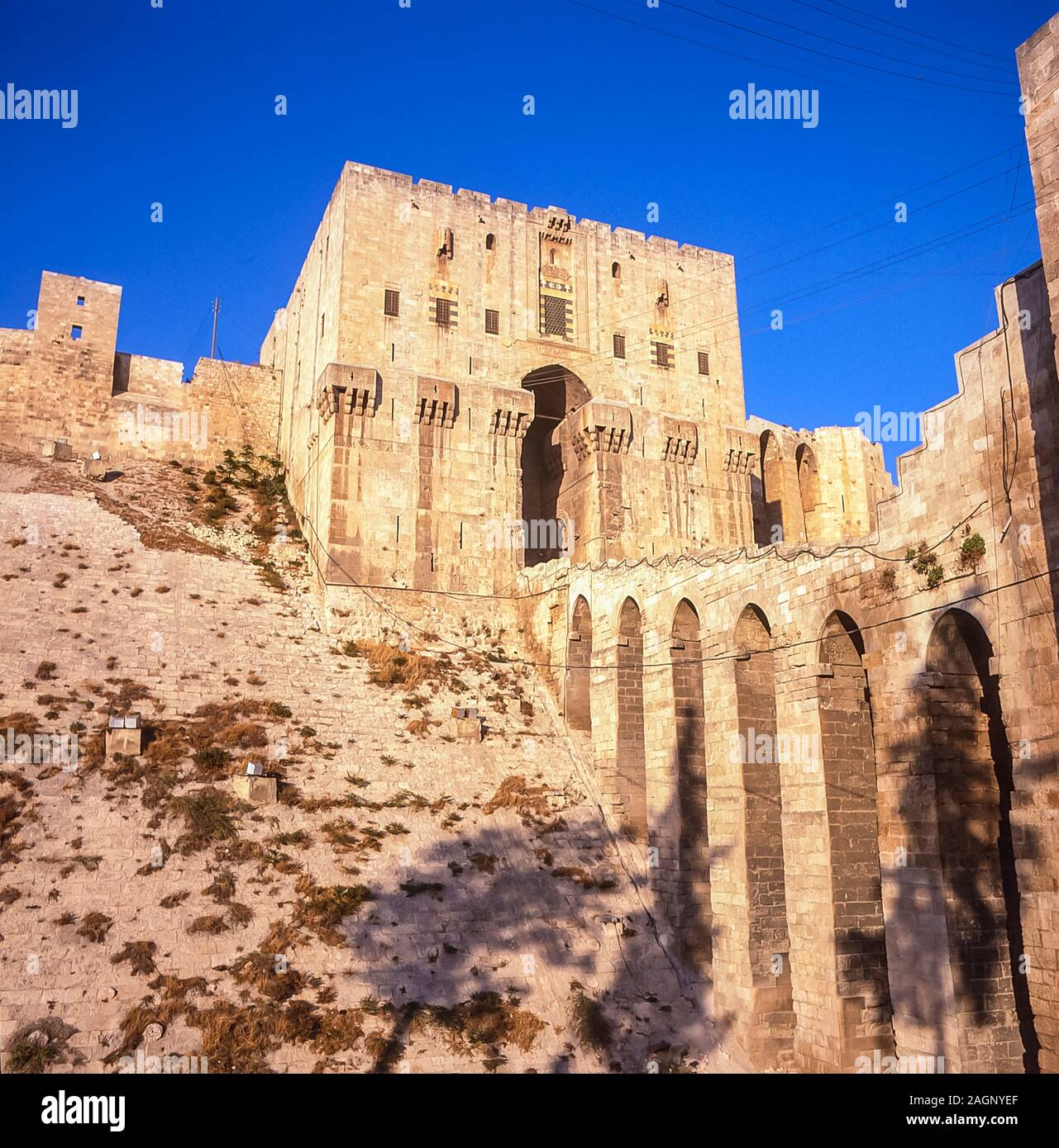 Syria. The main entrance to the formidable Citadel Fortress that ...