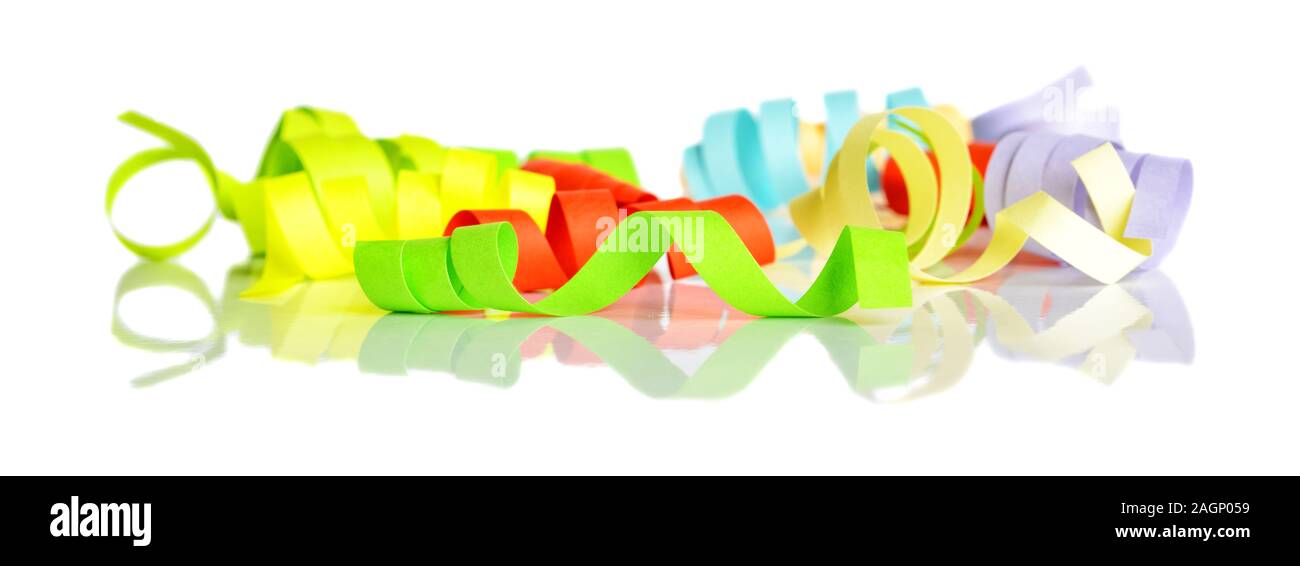 Multicolored paper streamers are isolated on a white background Stock ...