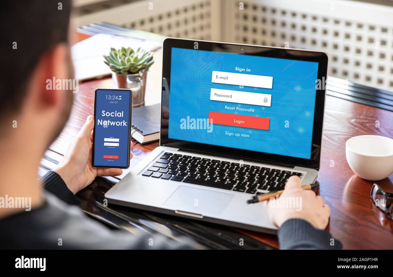 Password login on computer screen, Man holding a mobile phone, social ...