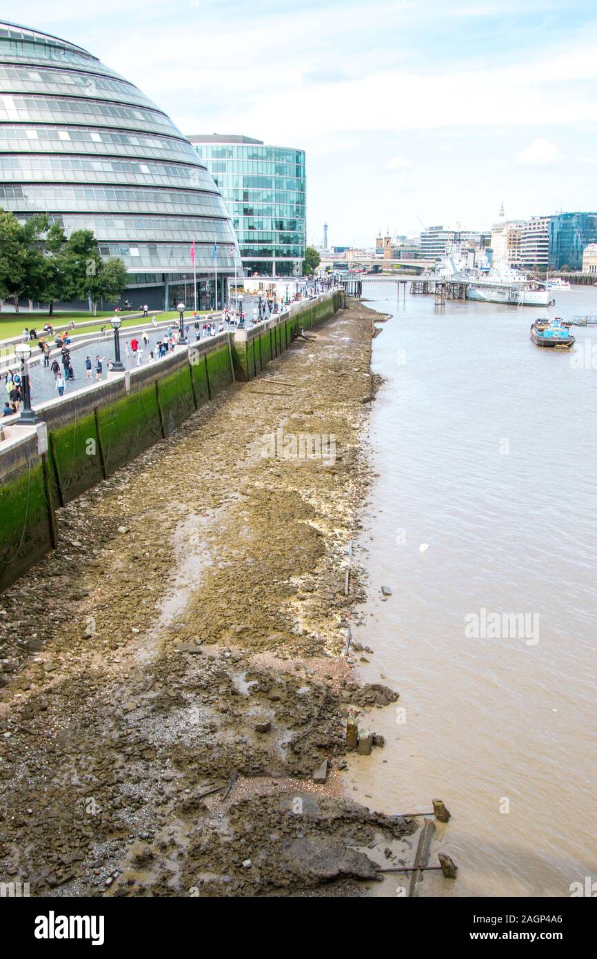 A small section of riverbed is shown at the side of the River Thames ...