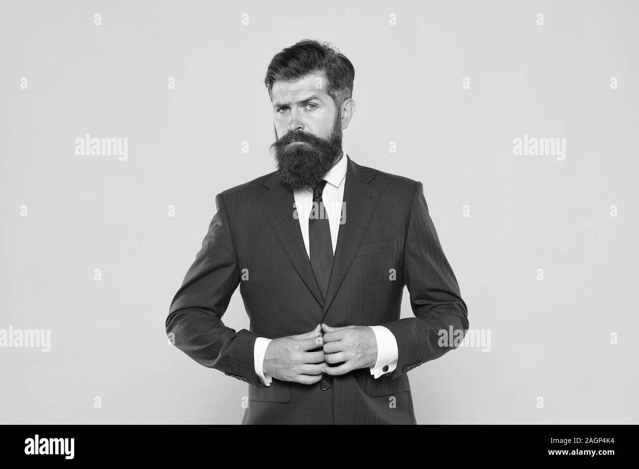 Charismatic bearded businessman in Black and White Stock Photos ...