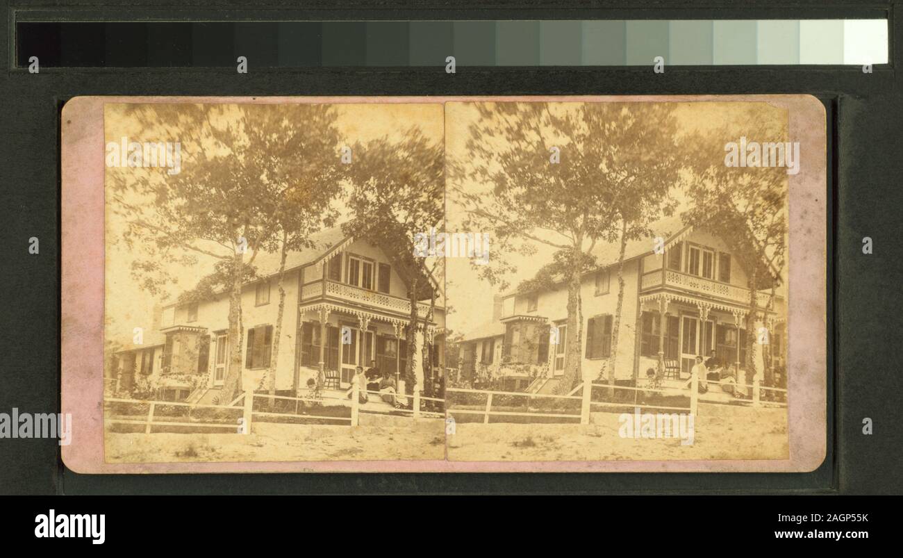 People on the porch of a cottage People on the porch of a cottage ...