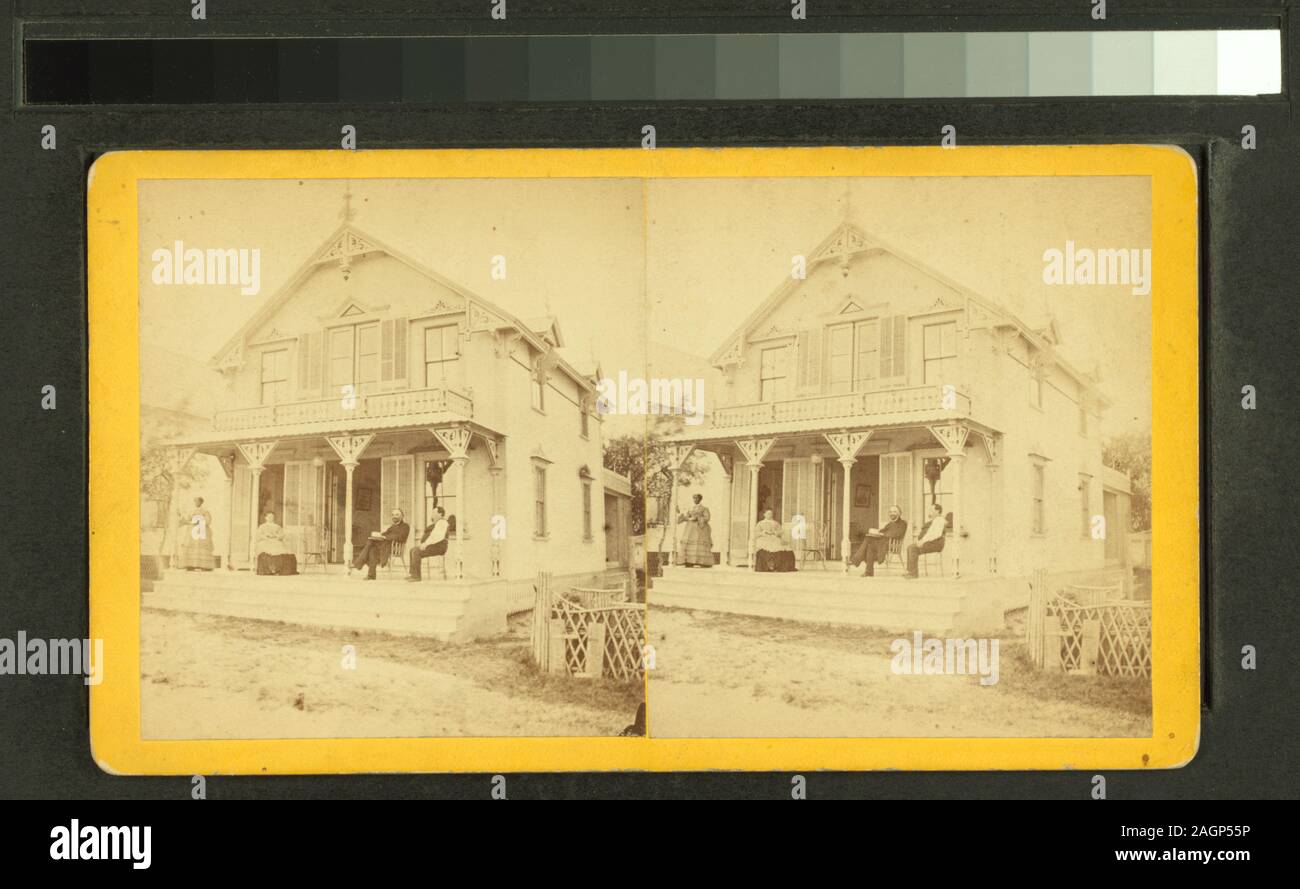 People on the porch of a cottage People on the porch of a cottage ...