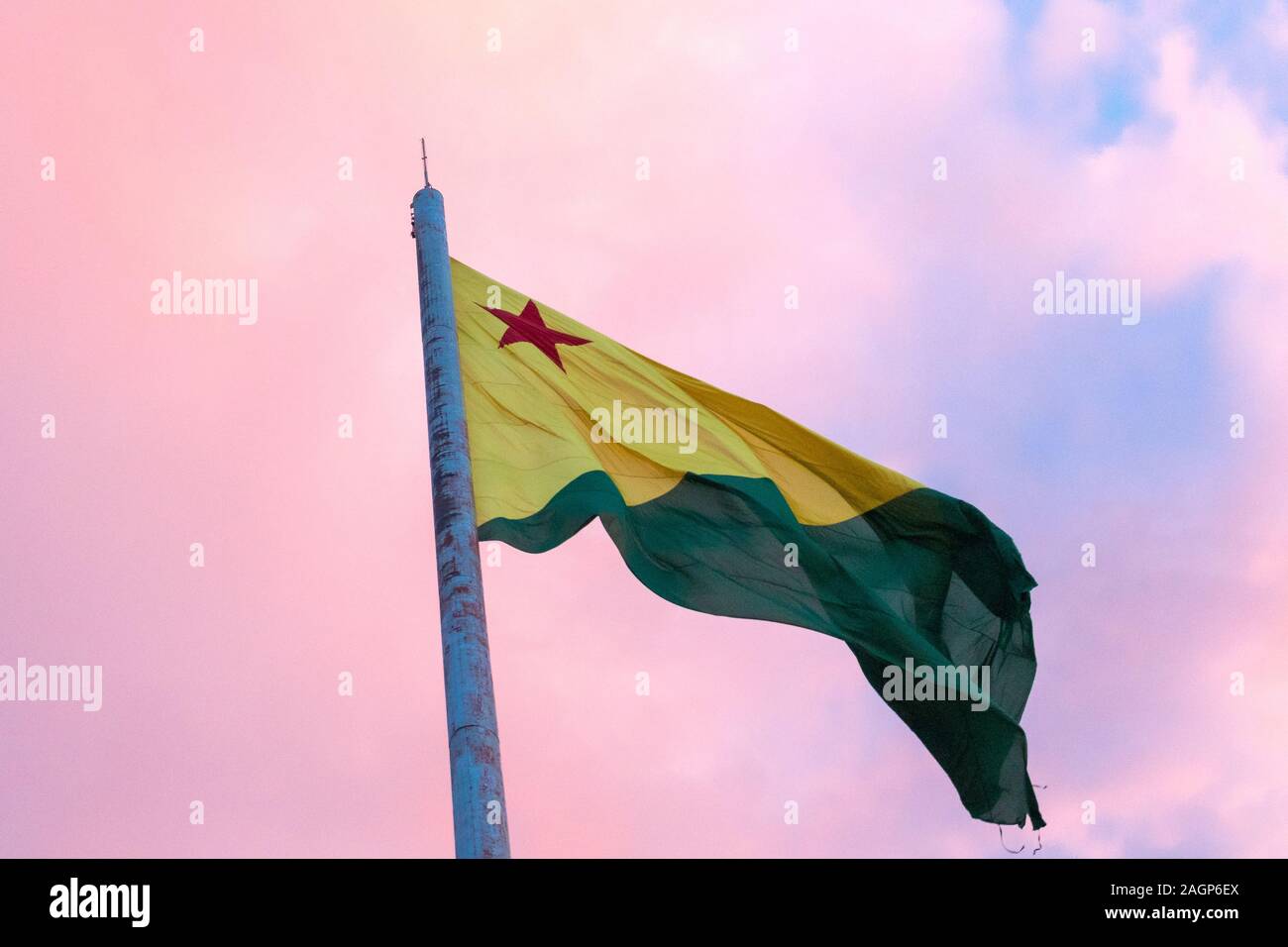 flag of the state of Acre with purple skies in the background in the ...