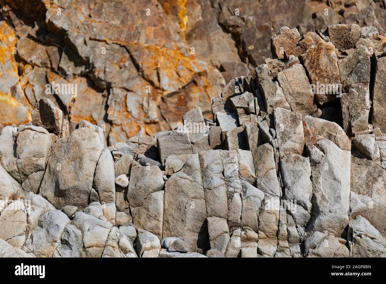 vertical layers of rock photographed on Sengamnon beach in Japan Stock ...