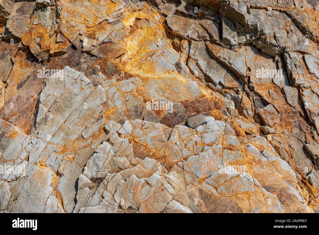 Layers of rock in various colors photographed on Sengamnon beach in ...