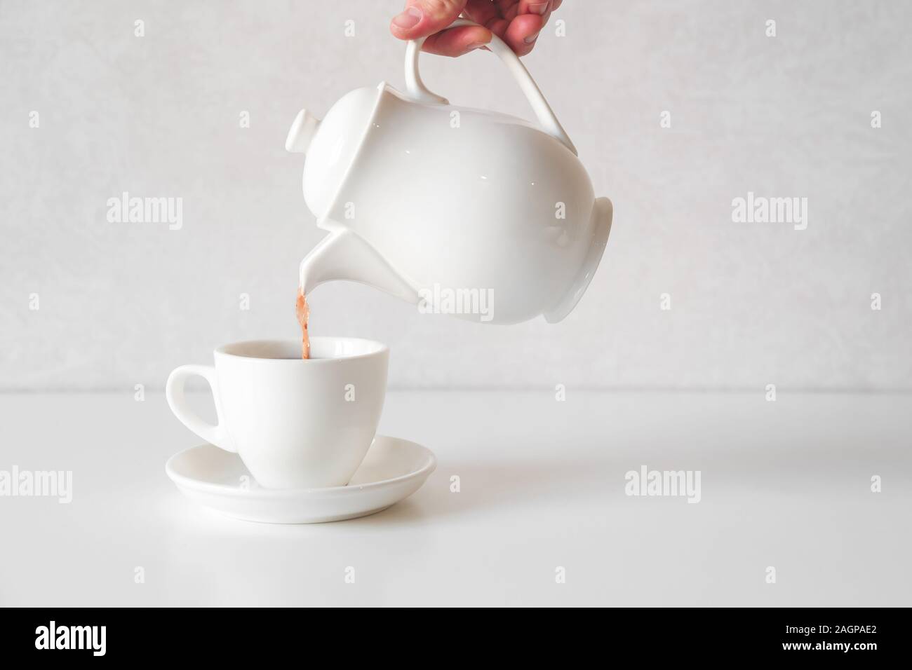 Tea china cup kettle pouring hi-res stock photography and images - Alamy