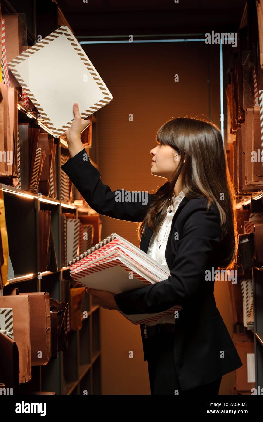 Young woman filing paperwork at FBI office in Jacksonville, Florida ...