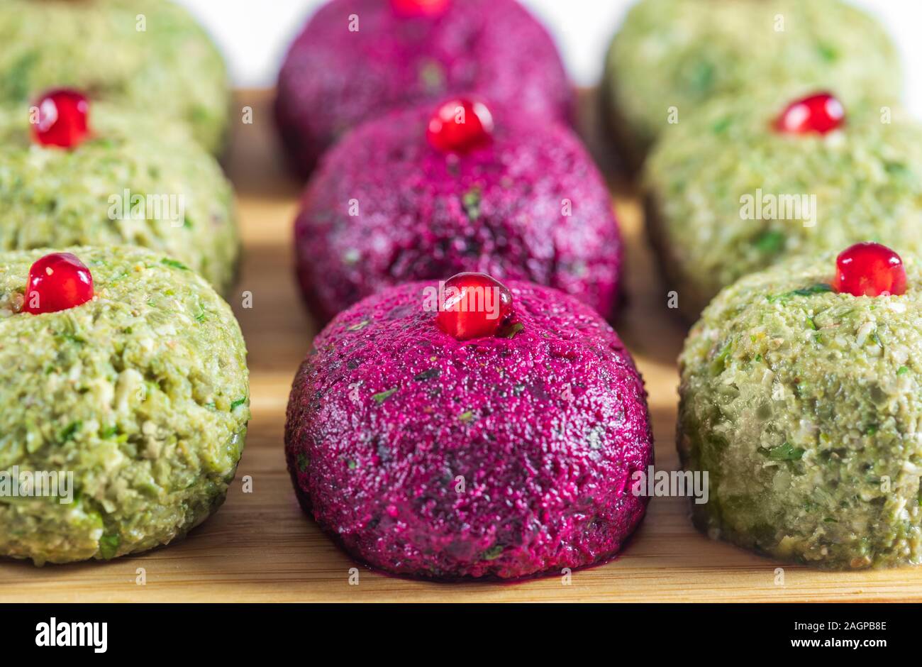 Pkhali with beets and beans on a chopping board close-up. Traditional ...
