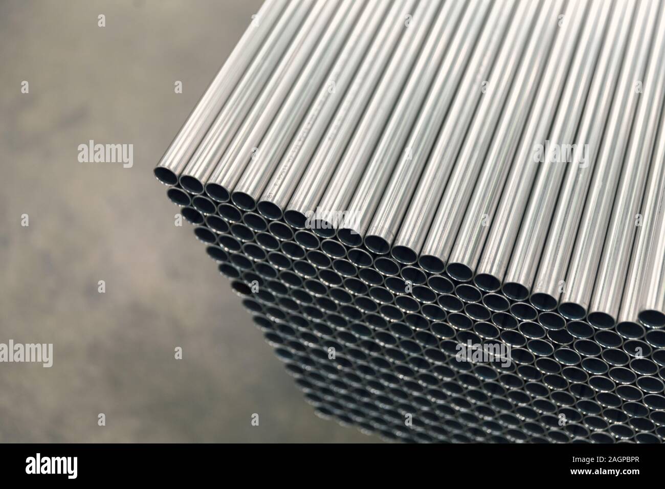 steel pipes on the pile, close up Stock Photo - Alamy