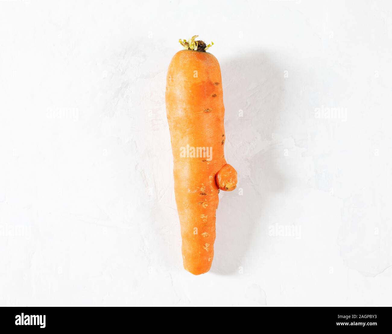 Odd shaped carrot hi-res stock photography and images - Alamy