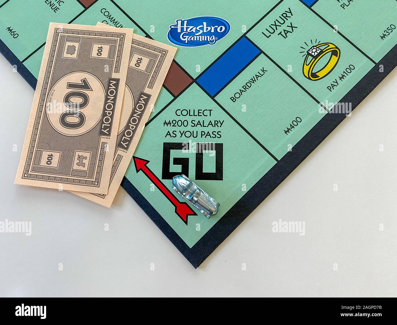 Orlando, FL/USA-12/20/19: The race car on the Passing Go square for the ...