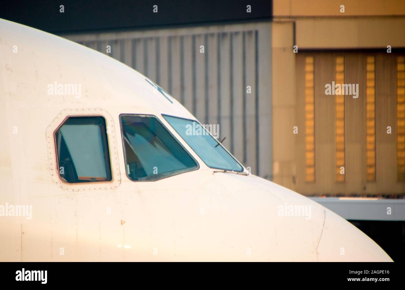 A side view of a large passenger aircraft's nose / cockpit Stock Photo ...