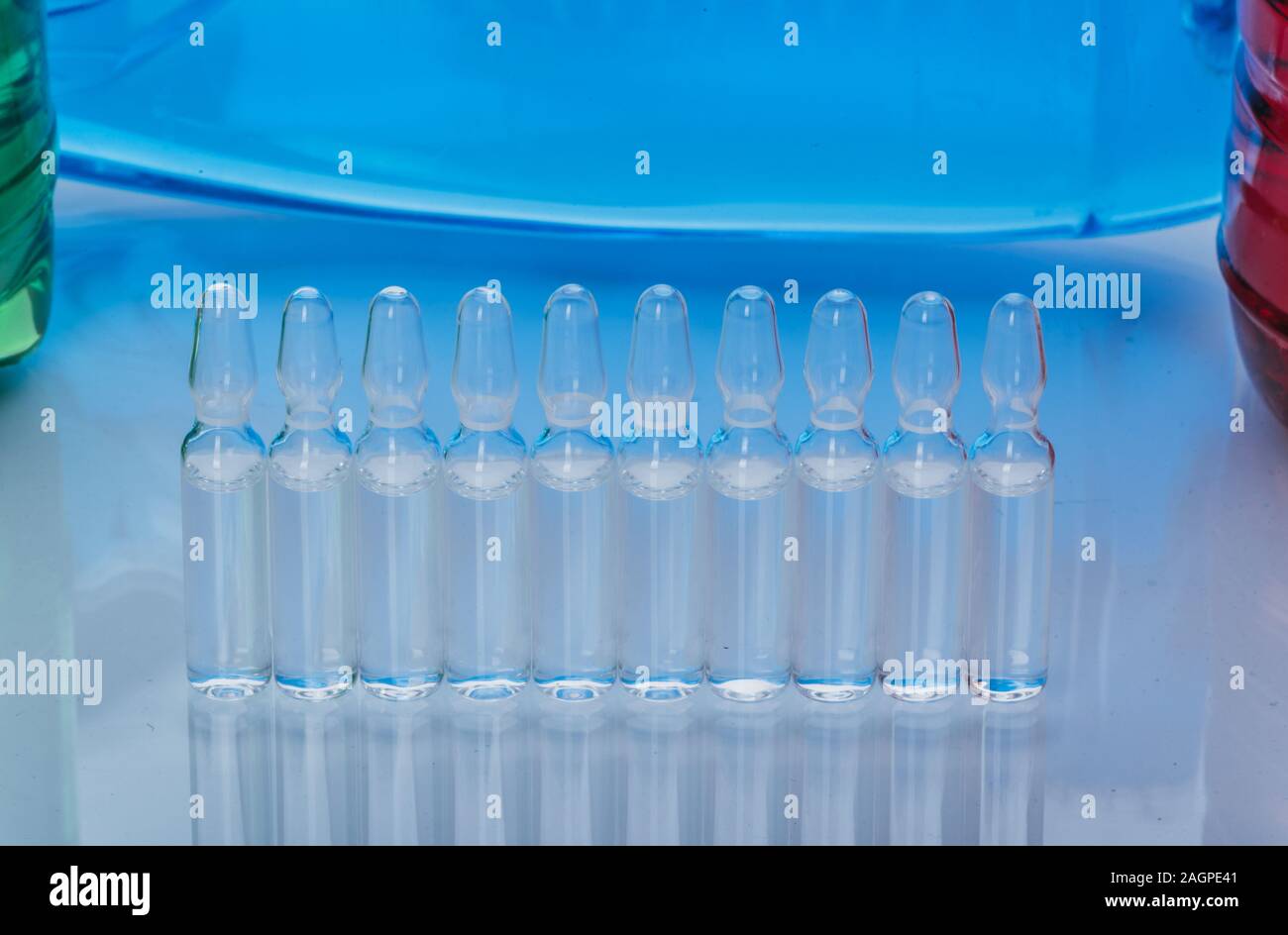 Glass medical ampoule vial for injection. Medicine is liquid sodium ...
