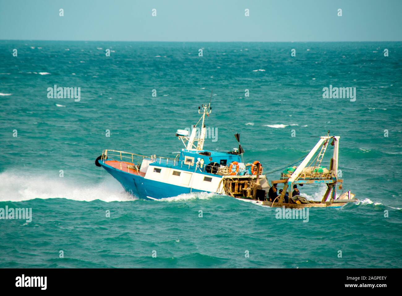 Fishing trawler heading out to sea hi-res stock photography and images ...