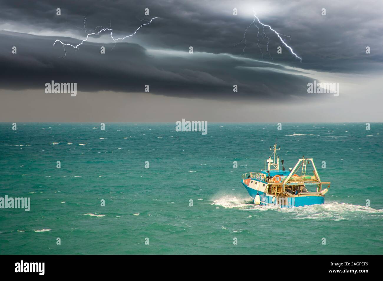 Fishing trawler heading out to sea hi-res stock photography and images ...