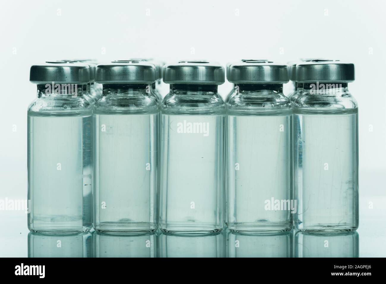 Glass medical ampoule vial for injection. Medicine is liquid sodium ...