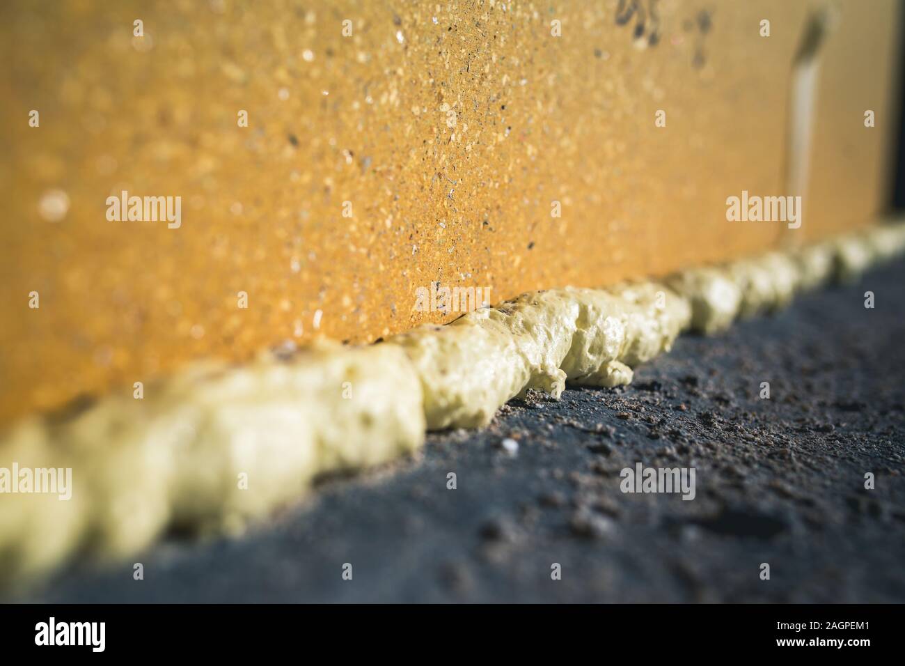 DIY concept. Construction PU - poly urethane foam. The window is ...