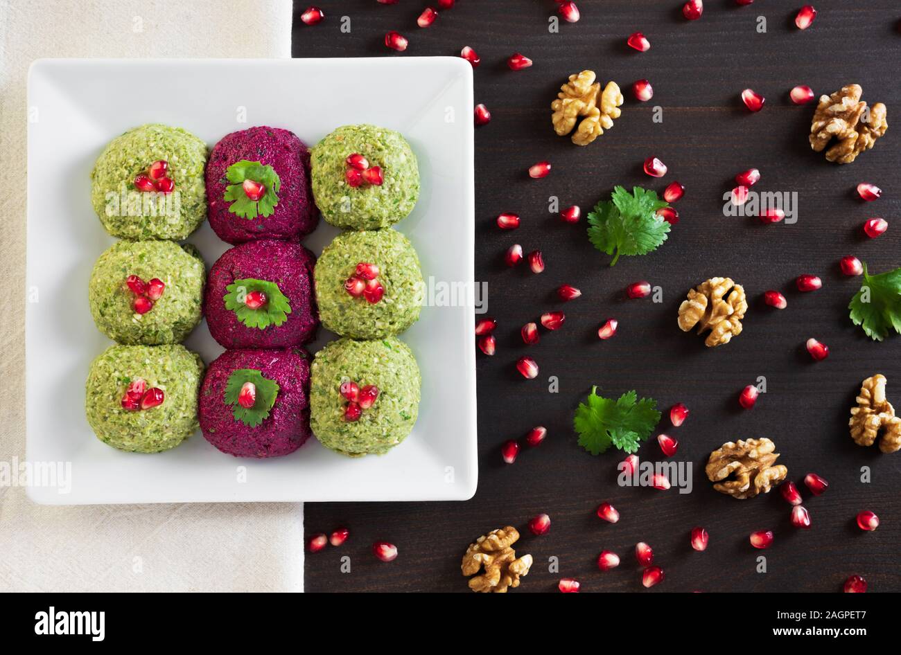 Pkhali with beets and beans on a dark wooden background. Traditional ...