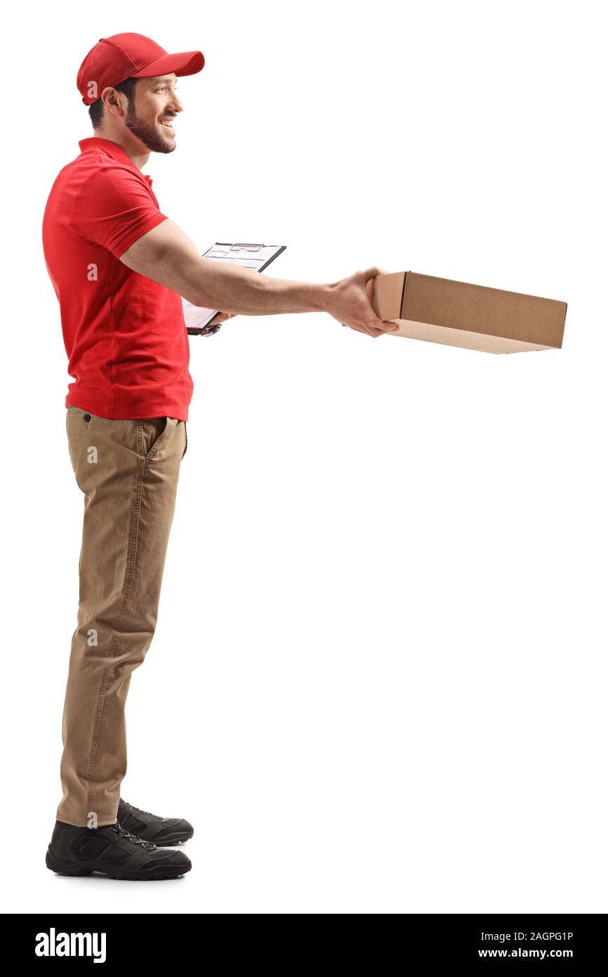 Full length profile shot of a delivery guy giving a package isolated on ...