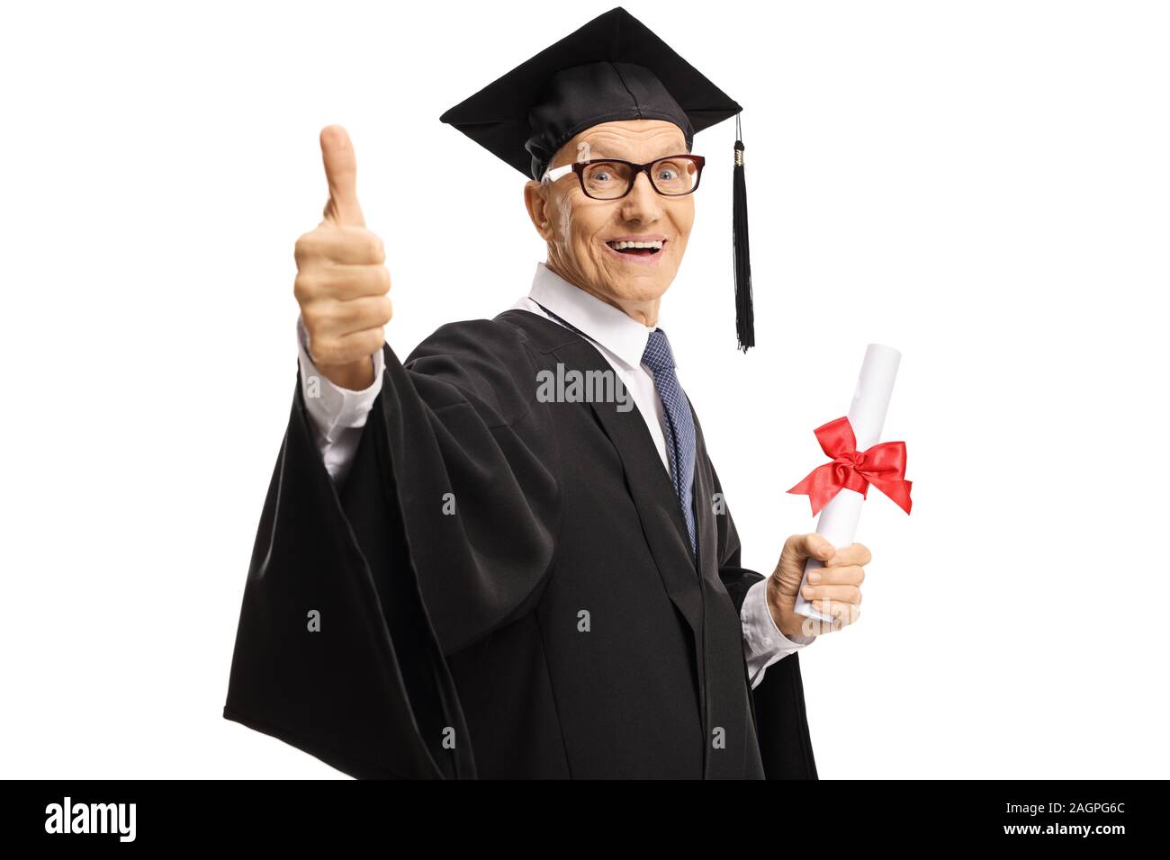 Happy senior man in a graduation gown holding a diploma and showing ...