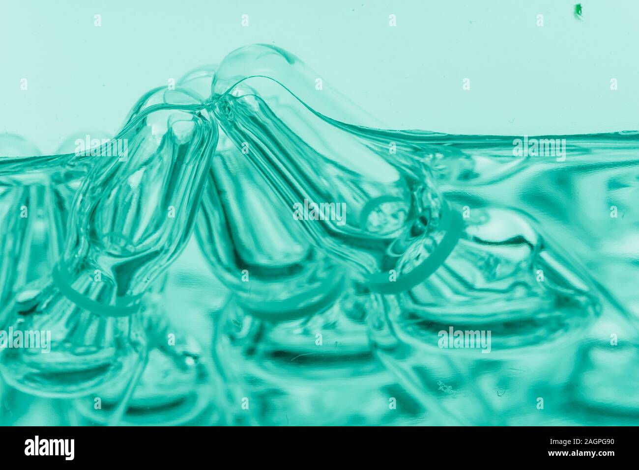 Glass medical ampoule vial for injection. Medicine is liquid sodium ...