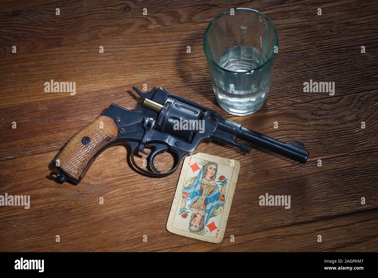 5 july 2019 - russian roulette - Queen of Diamonds plaing card, glass ...
