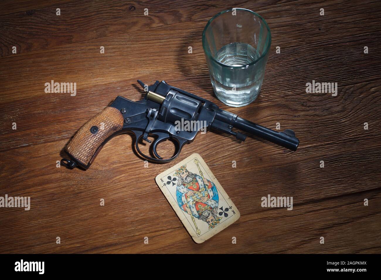 5 july 2019 - russian roulette - King of Clubs plaing card, glass of ...