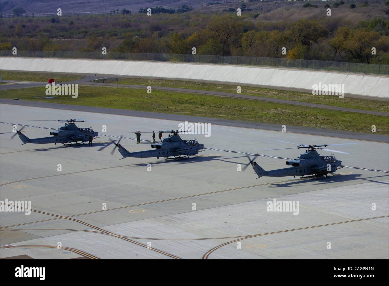 Three U.S. Marine Corps AH-1Z Vipers with Marine Light Attack ...