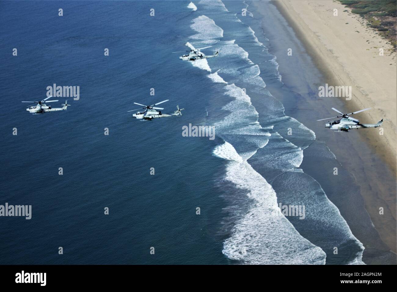 Four U.S. Marine Corps AH-1Z Vipers with Marine Light Attack Helicopter ...