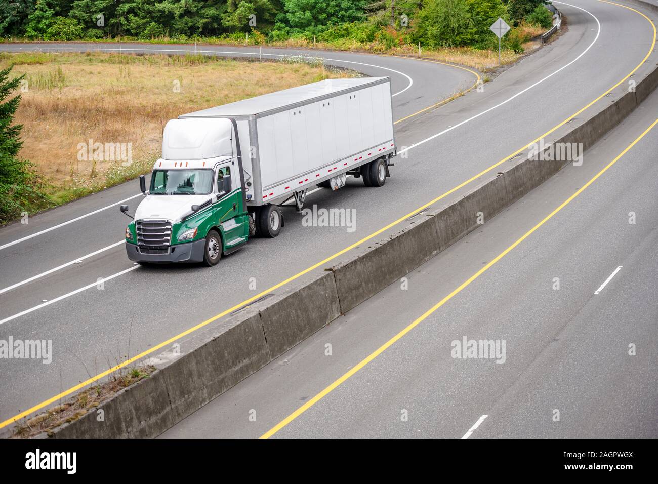 Big rig day cab semi truck with roof spoiler for local deliveries ...
