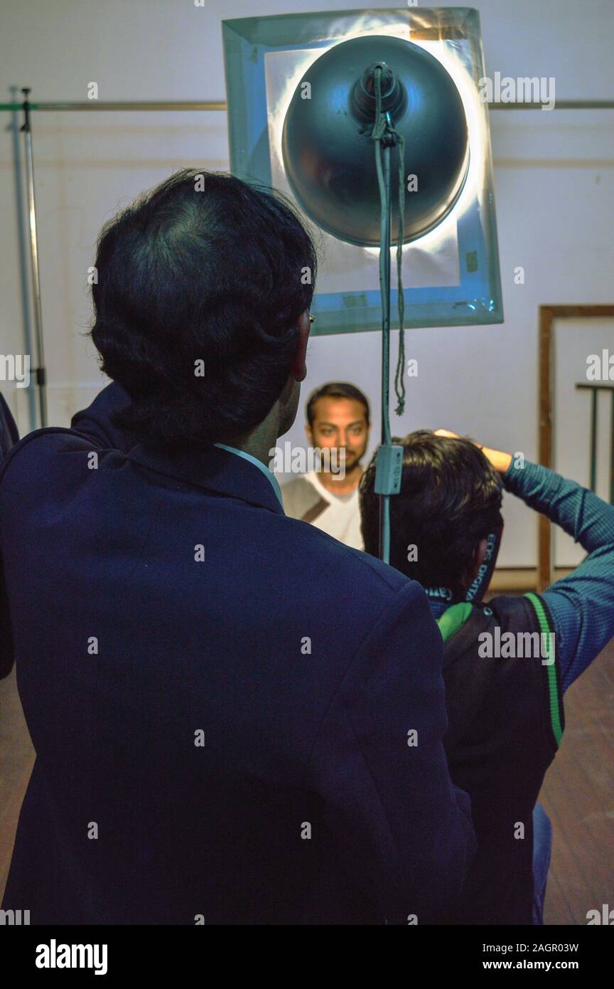 A teacher showing the effect after using diffuser at classroom Stock ...