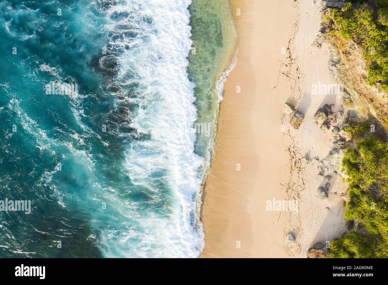 View from above, stunning aerial view of a rocky shore with a beautiful ...