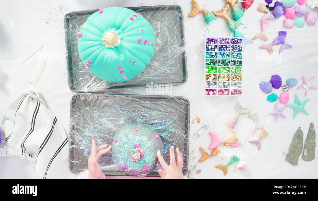 Flat lay. Step by step. Decorating art pumpkins with rhynestones ...