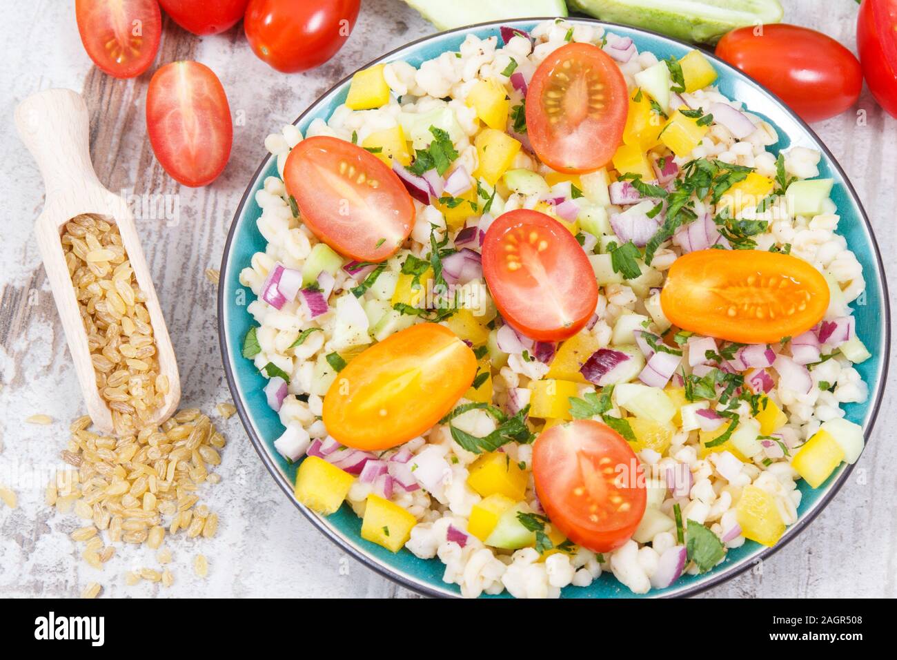 Fresh prepared salad with vegetables and bulgur groats. Healthy meal ...