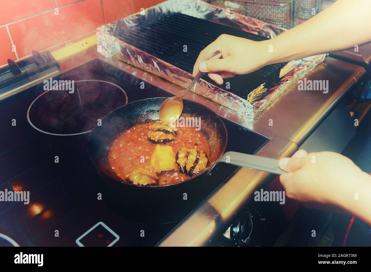 Professional chef cooking meal hi-res stock photography and images - Alamy