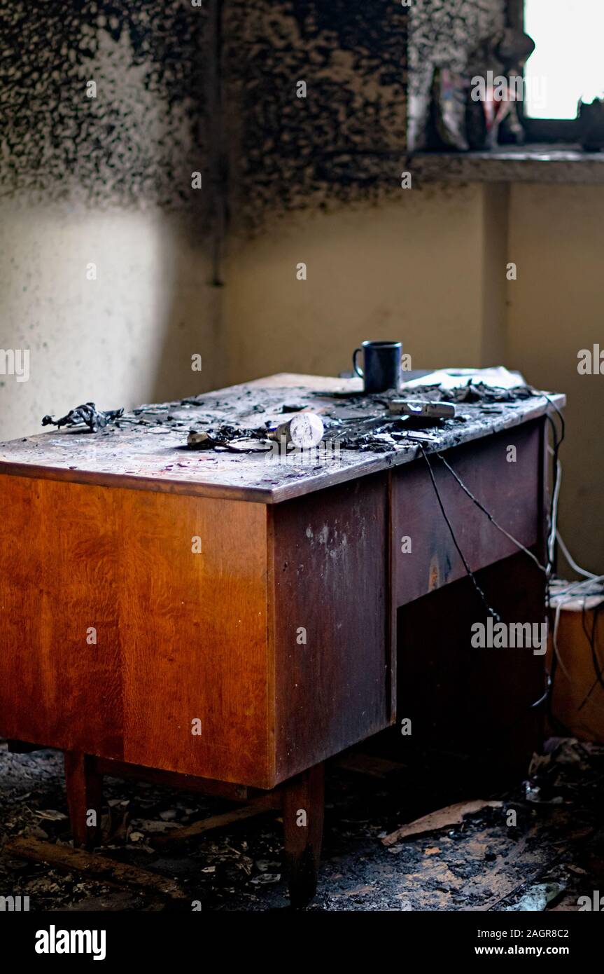 furniture in house after burned by fire with smoke and dust in burn ...