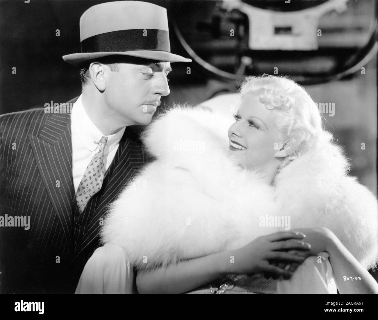 WILLIAM POWELL and JEAN HARLOW on set candid portrait during filming of ...