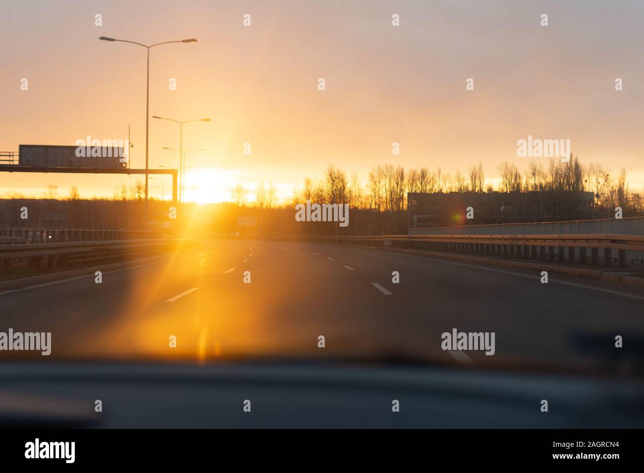 Car sunrise highway hi-res stock photography and images - Alamy