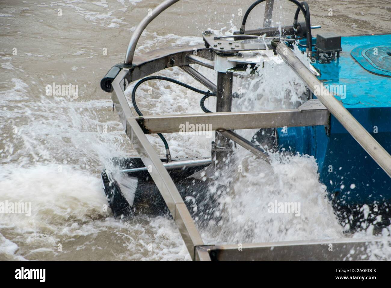 Ship engines spooling up with the propellers chopping through the water ...