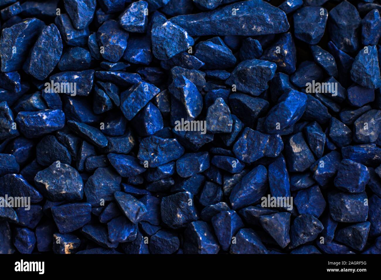Decor, surface and nature concept - Dark blue stone pebbles as abstract ...
