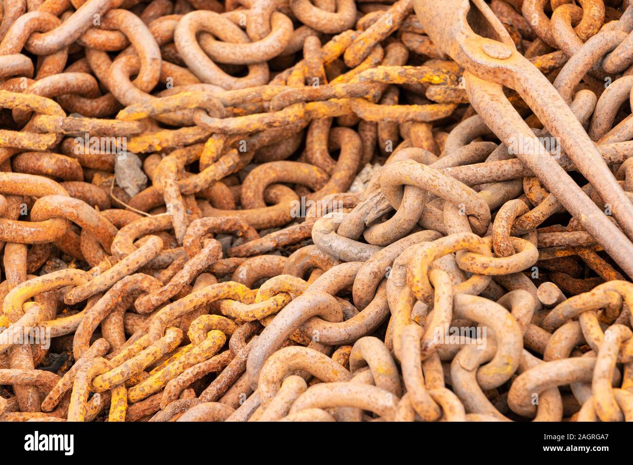 pile of rusty old cast iron chains in a forge at the Black Country ...