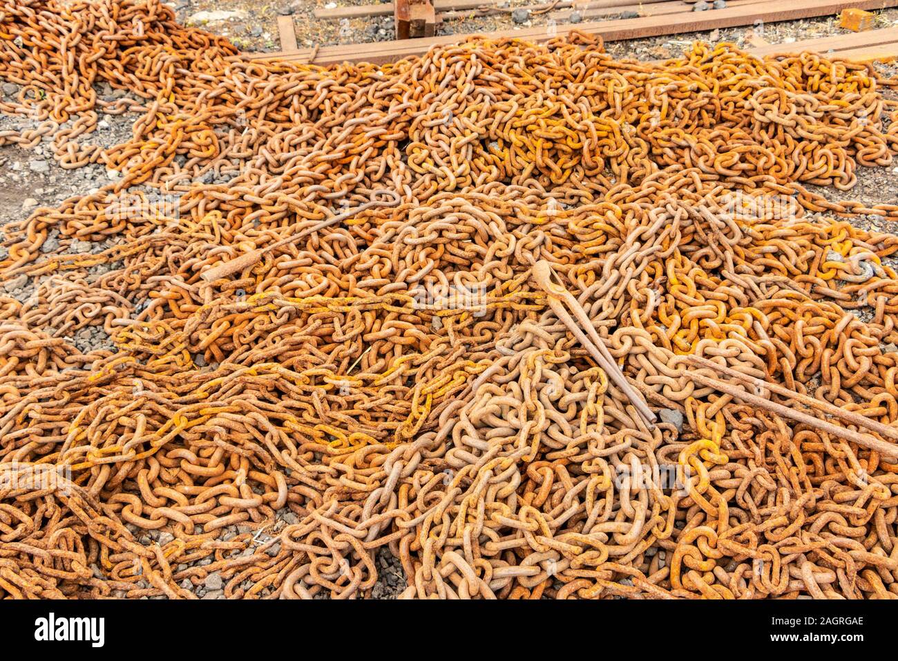 pile of rusty old cast iron chains in a forge at the Black Country ...