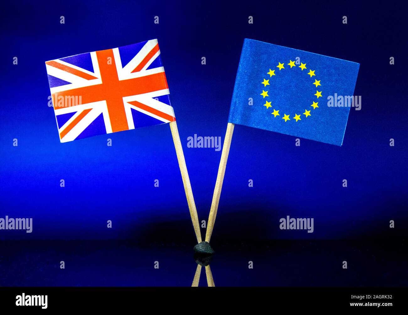 The British and EU flags stand together, against a sky blue background ...