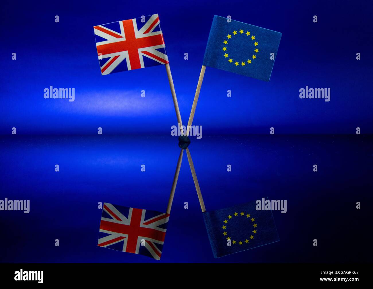 The British and EU flags stand together, against a sky blue background ...