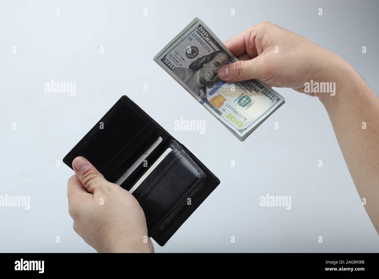 Man carrying bag money hi-res stock photography and images - Alamy